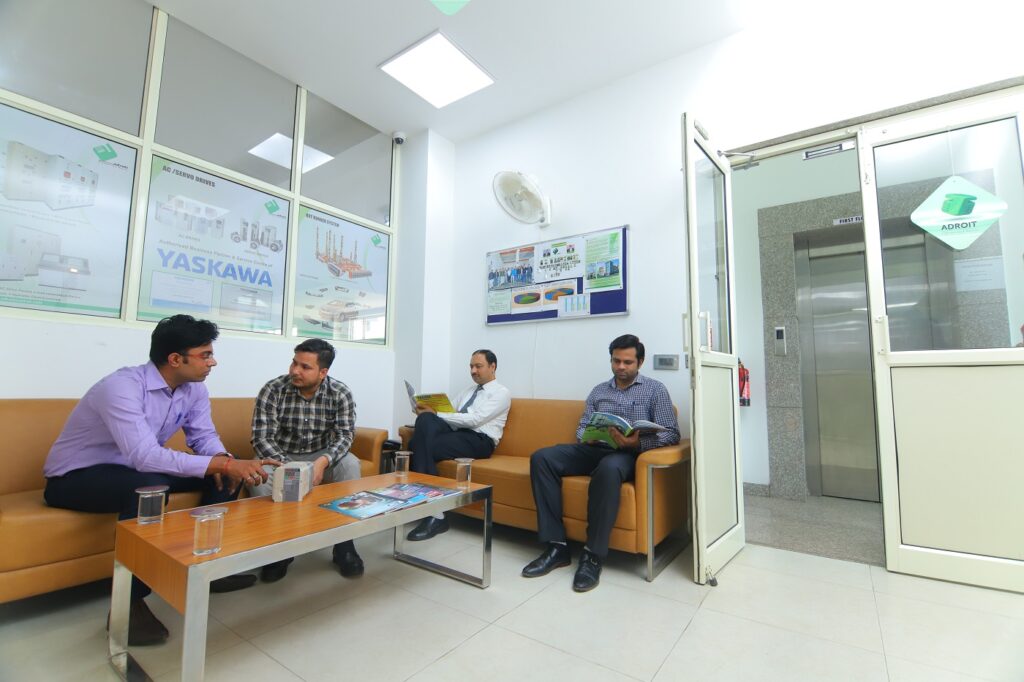 Team Working in Office - Adroit Control