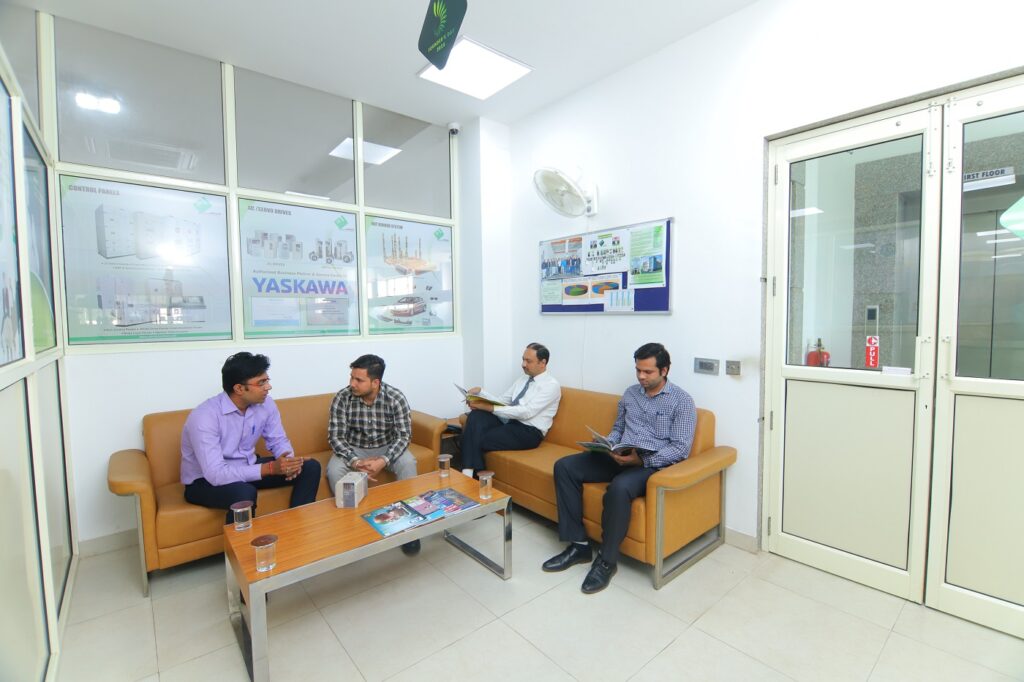 Team Working in Office - Adroit Control